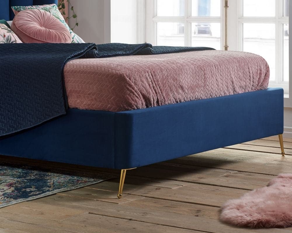 Lottie Blue Velvet Winged Ottoman Storage Bed | Happy Beds
